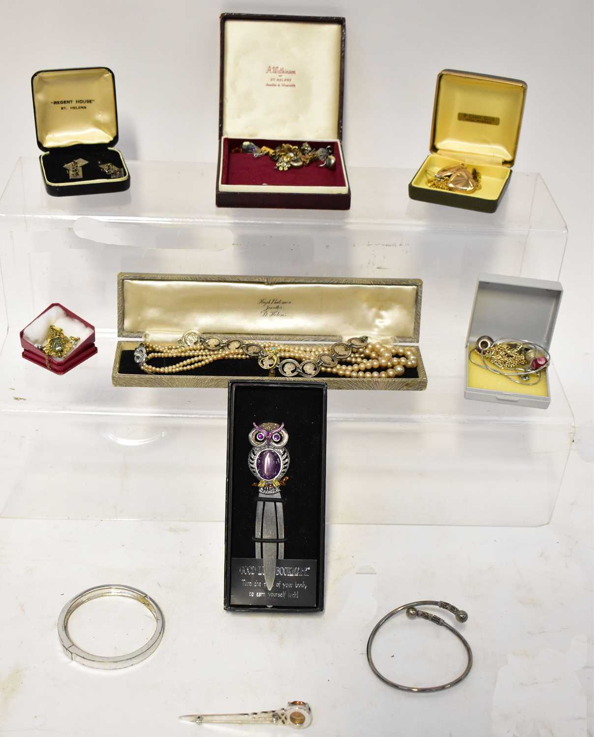 A quantity of costume jewellery including a pierced coin bracelet ...