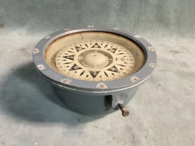 A Husun cased Sestrel gimbal mounted naval compass with floating rose ...