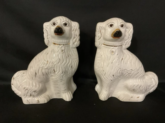 A pair of C19th Staffordshire wally dogs with hand painted faces ...