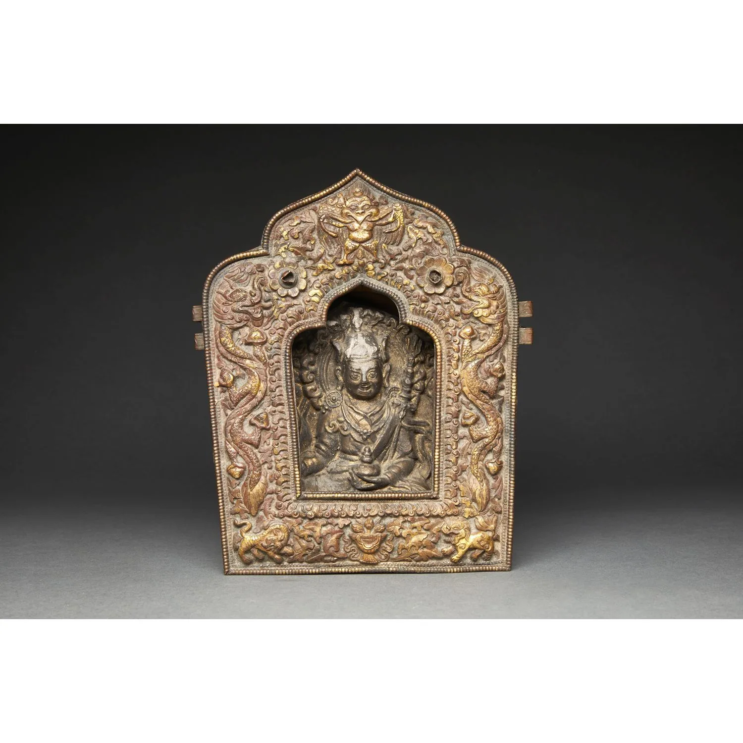 RELIQUARY BOX - "GA'U in copper, formerly gilded, the niche framed ...