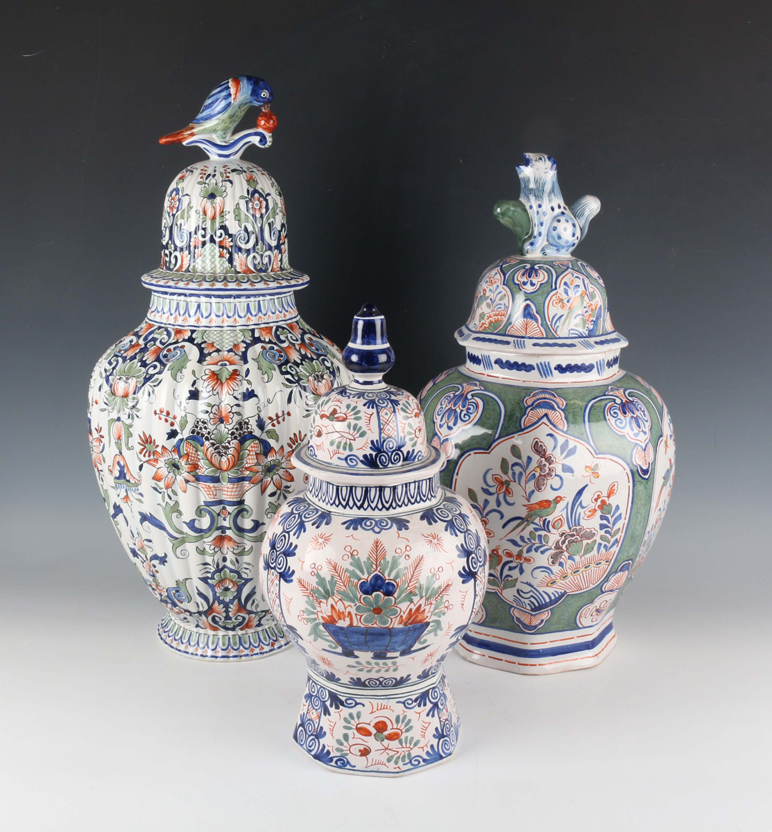 A Rouen faience vase and cover, 20th century, the lobed high shouldered ...