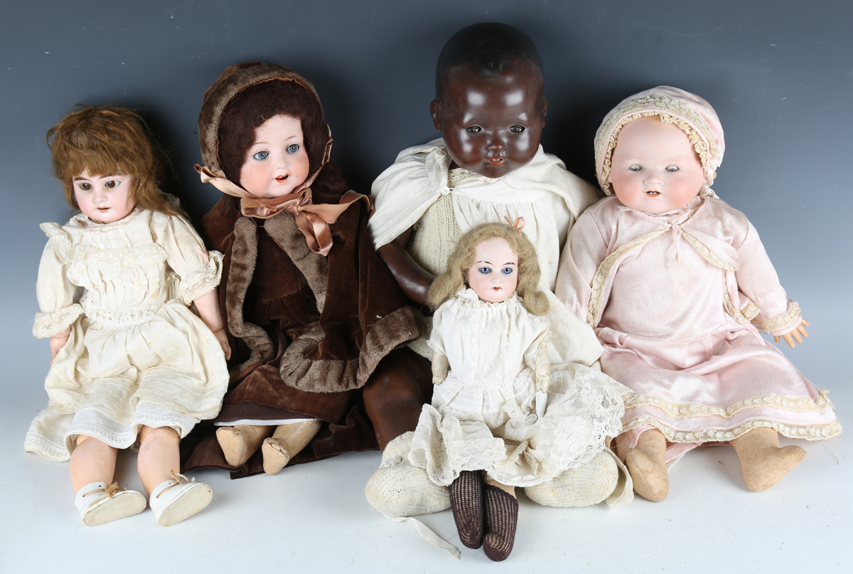 Ten Armand Marseille bisque head dolls, including a head and shoulders ...