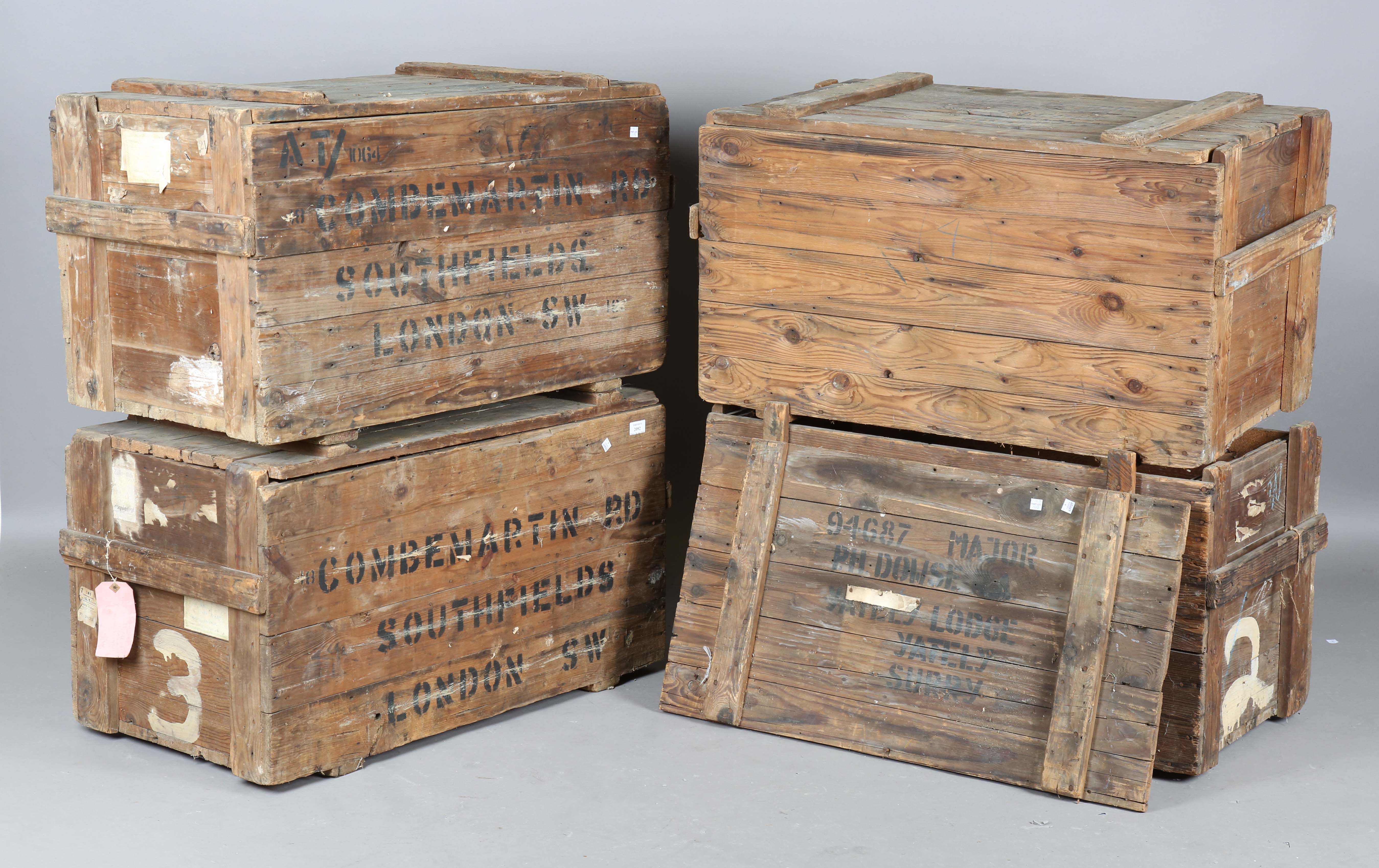 A group of mid-20th century pine packing crates with stencilled details ...