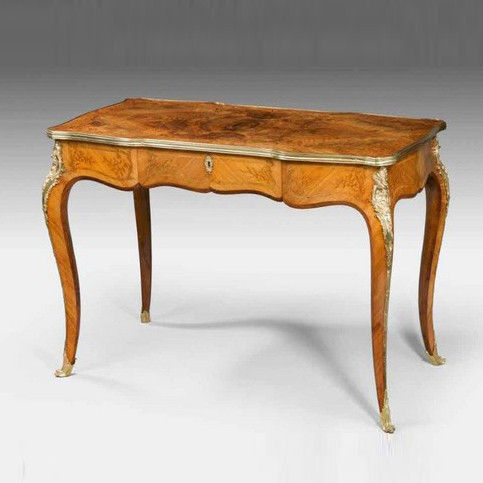 A fine mid Victorian burr walnut writing table | Barnebys