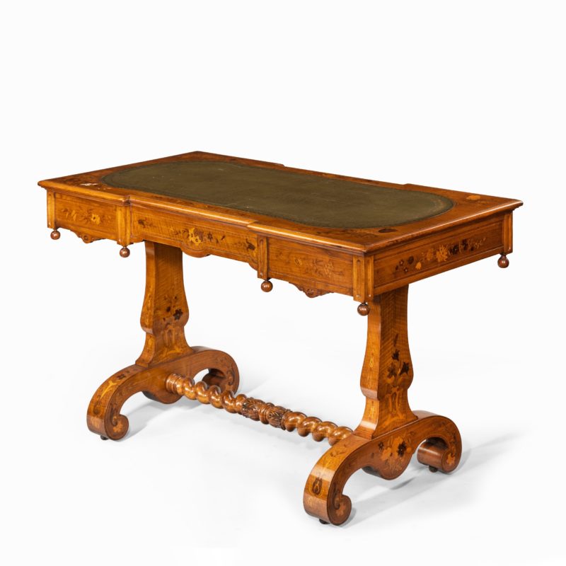 A Victorian walnut marquetry writing table attributed to Edward Holmes ...