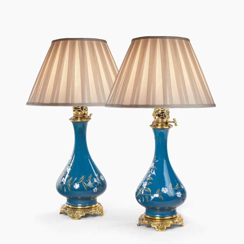 A pair of French pate-sur-pate ceramic oil lamps | Barnebys