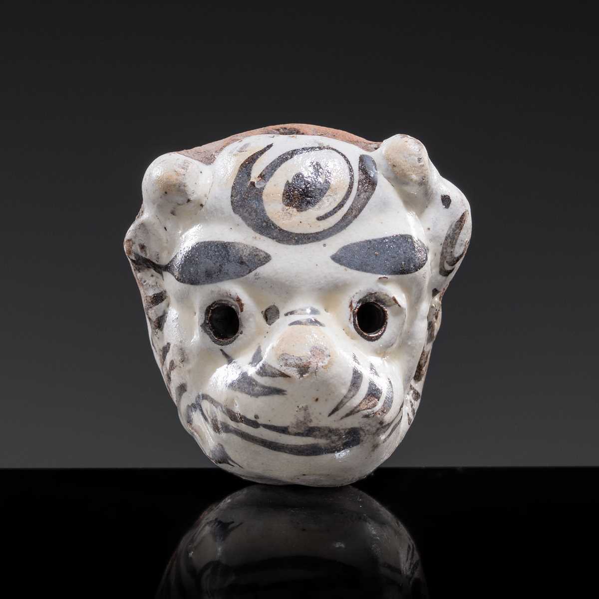 A CIZHOU SLIP PAINTED ‘TIGER MASK’ WHISTLE, JIN-YUAN DYNASTY | Barnebys