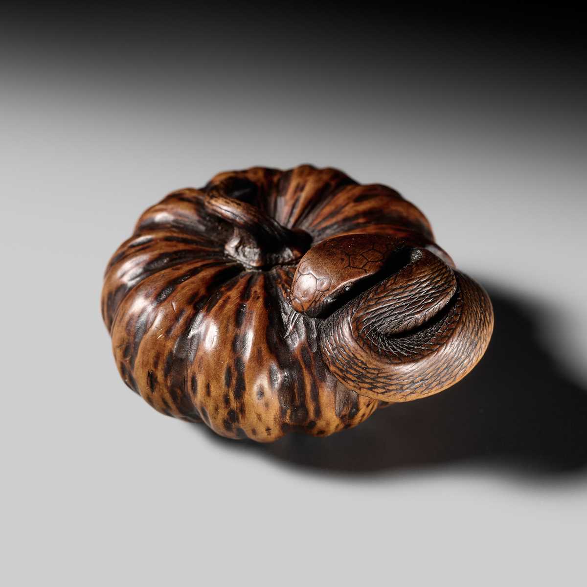 TADAKUNI: A FINE NAGOYA SCHOOL WOOD NETSUKE OF SNAKE WINDING THROUGH A ...