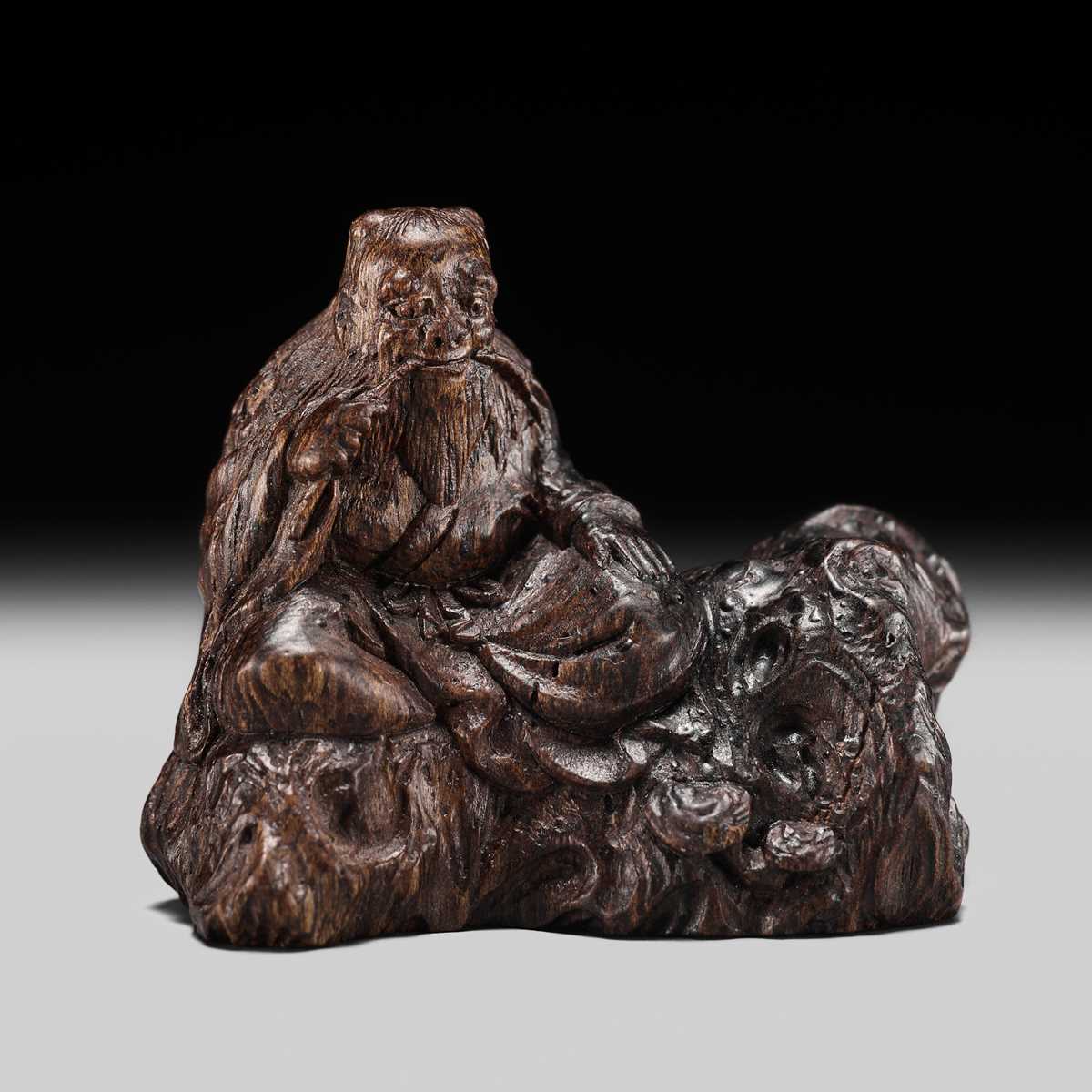 HOICHI: A RARE WOOD NETSUKE OF SHINNO | Barnebys
