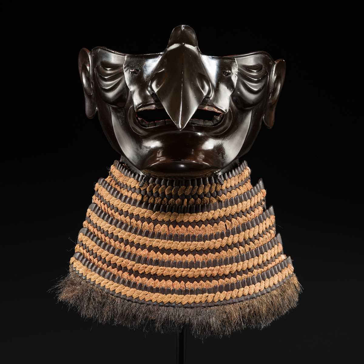 A LACQUERED IRON TENGU MENPO | Barnebys