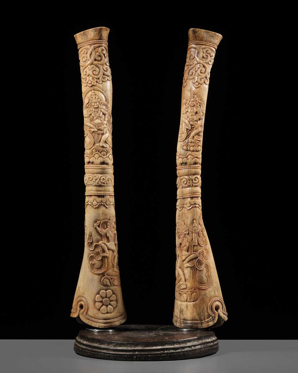 A RARE PAIR OF LARGE BONE TRUMPETS DEPICTING YOGINS AND DANCING DAKINIS ...