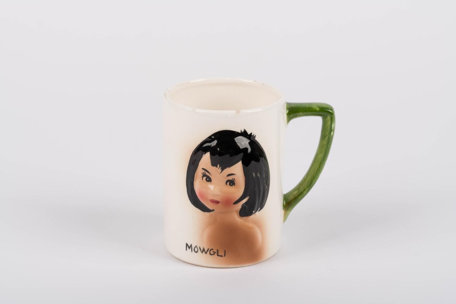 A 1960s "The Jungle Book" Mowgli Mug. | Barnebys