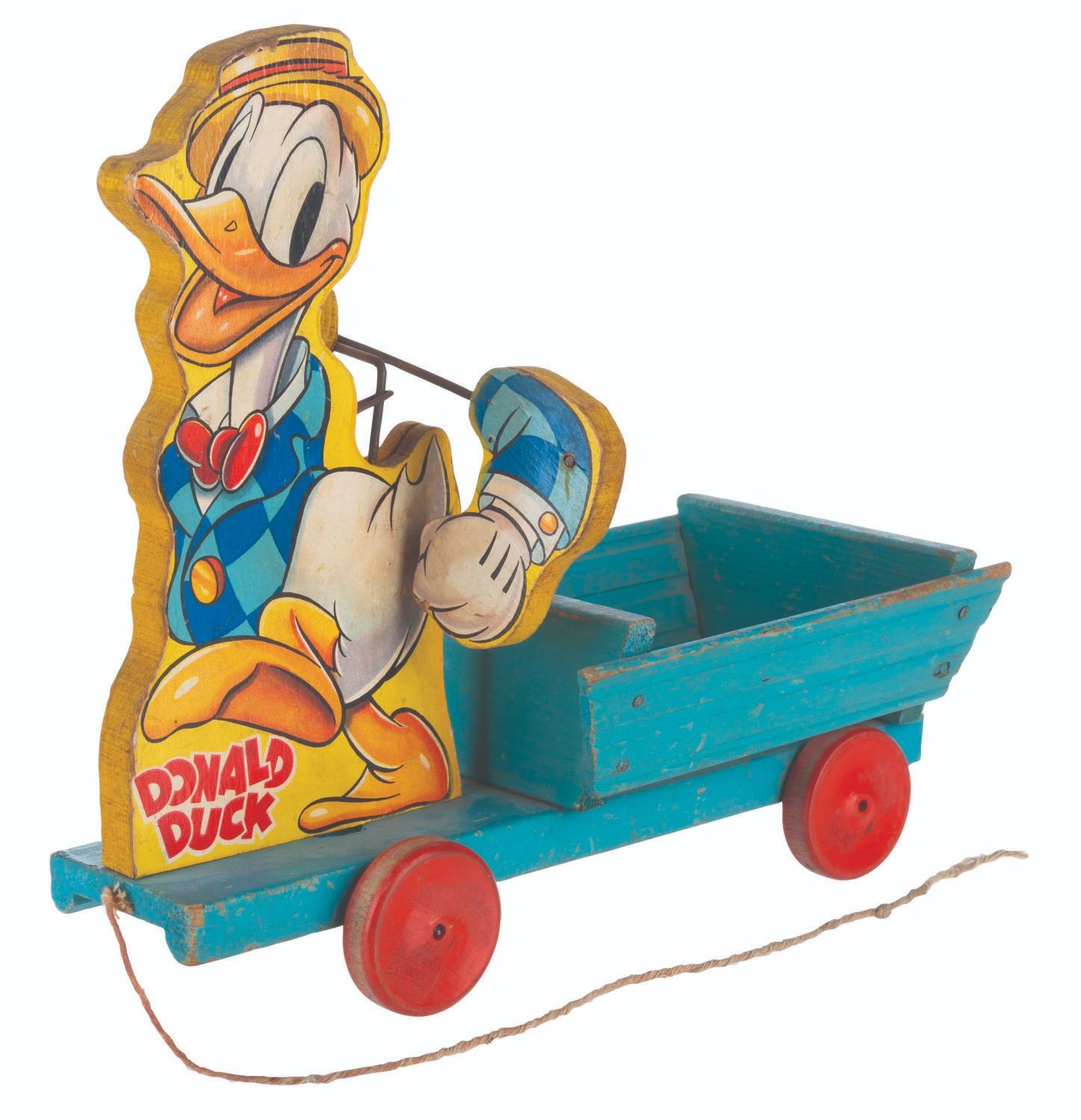 A Donald Duck Strutter Pull Toy, Fisher Price No. 510. | Barnebys