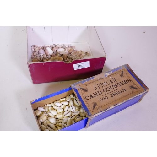 A box of African card counters (shells) and a quantity of sp... | Barnebys