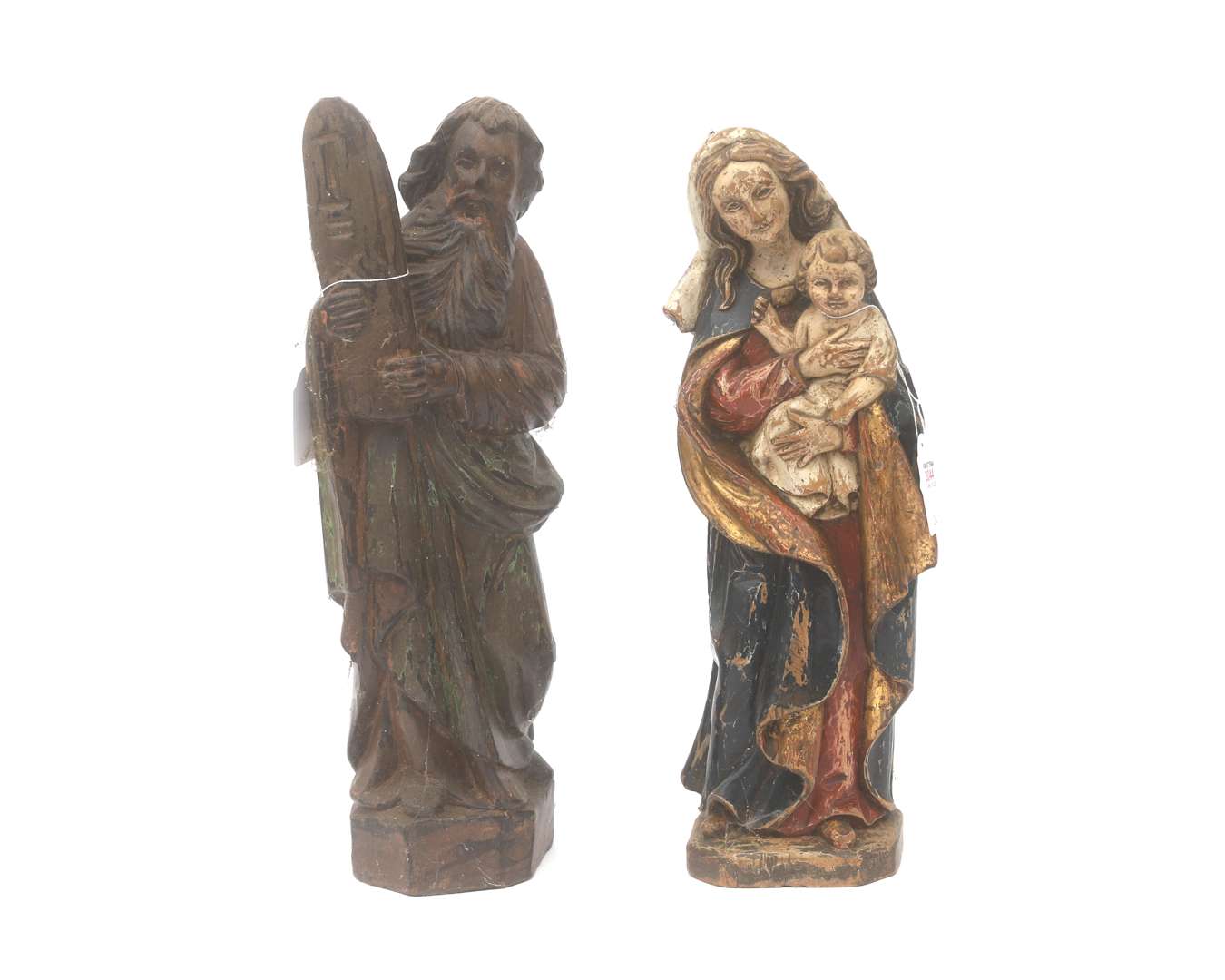 Een houten sculptuur van Mozes en Maria met kind, 19e/20e eeuw | Barnebys