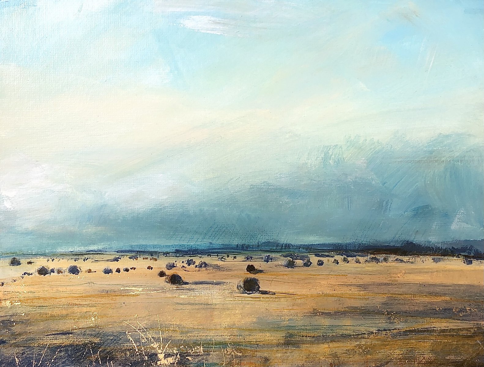 Hay bales under heavy cloud by Sarah Carrington | Barnebys