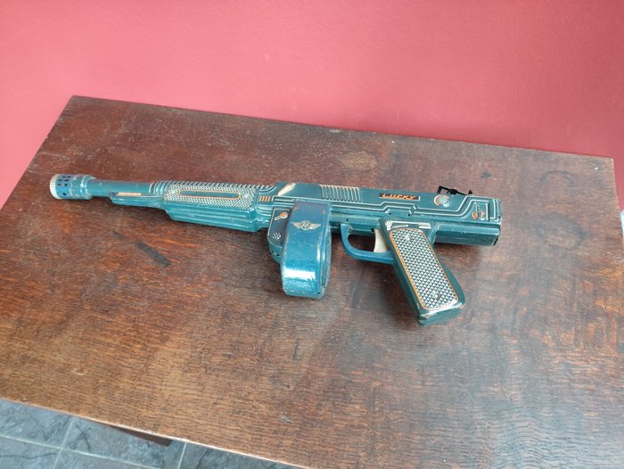 Lucky - Lucky Burp Gun - Wind-up tin toy - 1950-1959 - Japan | Barnebys