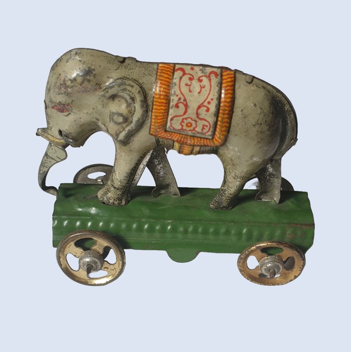 Fischer - Tin toy - Rare Antique Tin Penny Toy | Barnebys