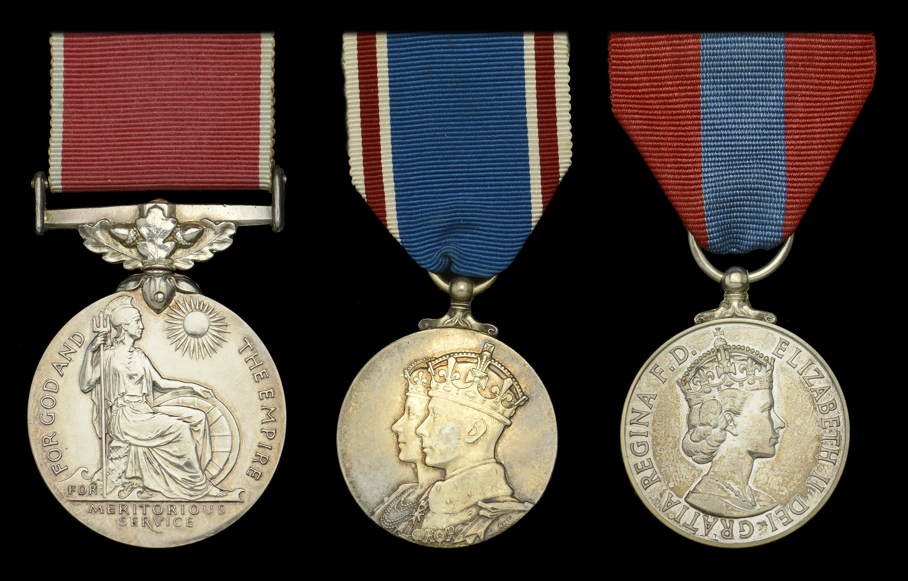 A post-War B.E.M. group of three awarded to Mr. G. W. H. Rawlinson ...