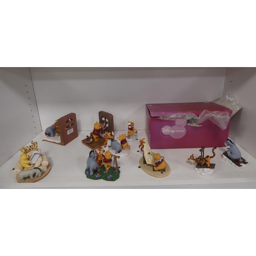 Group of Disney Winnie the Pooh figures and groups, to inclu... | Barnebys