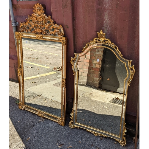 Two reproduction gilt moulded ornate framed mirrors, the lar... | Barnebys
