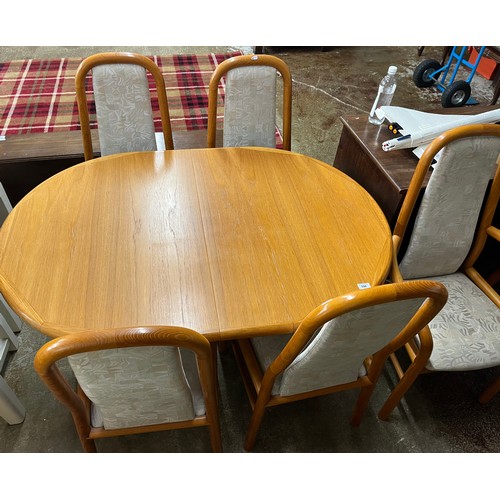 Danish teak extendable dining table with with six dining cha... | Barnebys