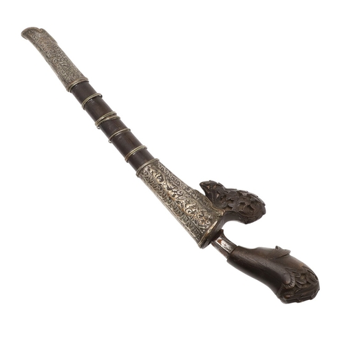 A SUMATRAN TUMBOK LADA DAGGER AND SCABBARD. The 17.5 cm narr... | Barnebys