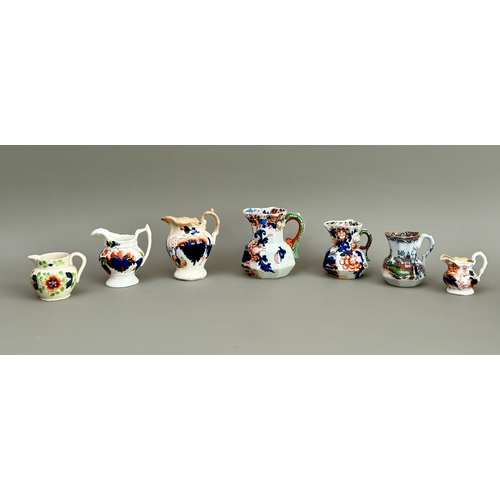 A collection of 19th century miniature or milk jugs - three ... | Barnebys
