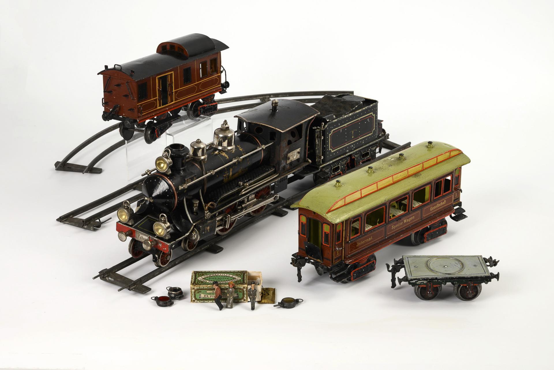 Rare old locomotive "FE 4021" with tender, 2 cars and 5 rails. Märklin ...
