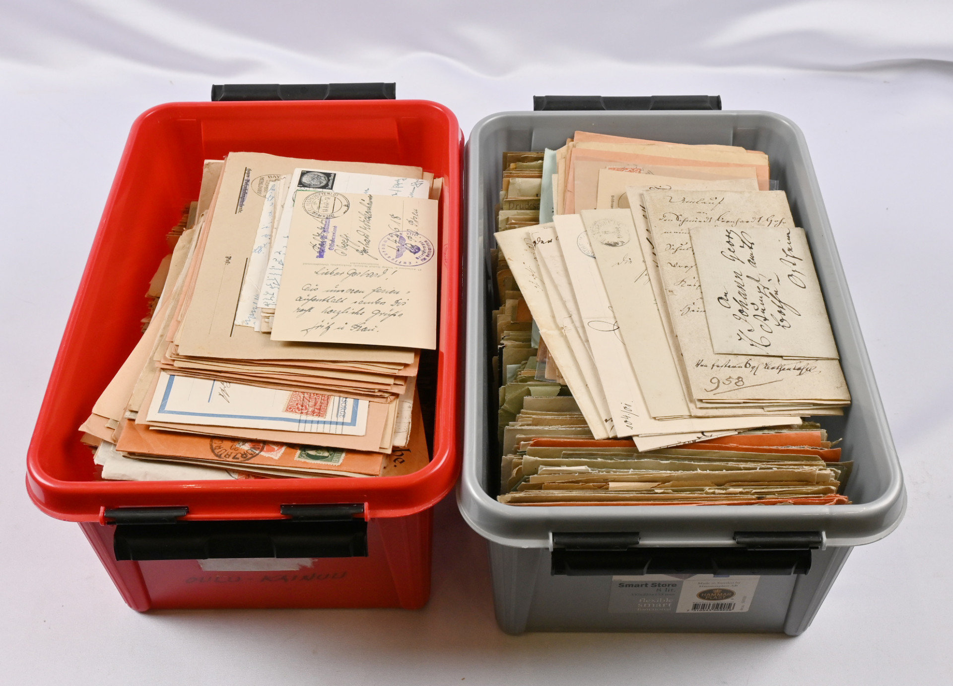 Postal item lot in two plastic boxes starting from stampless letters ...