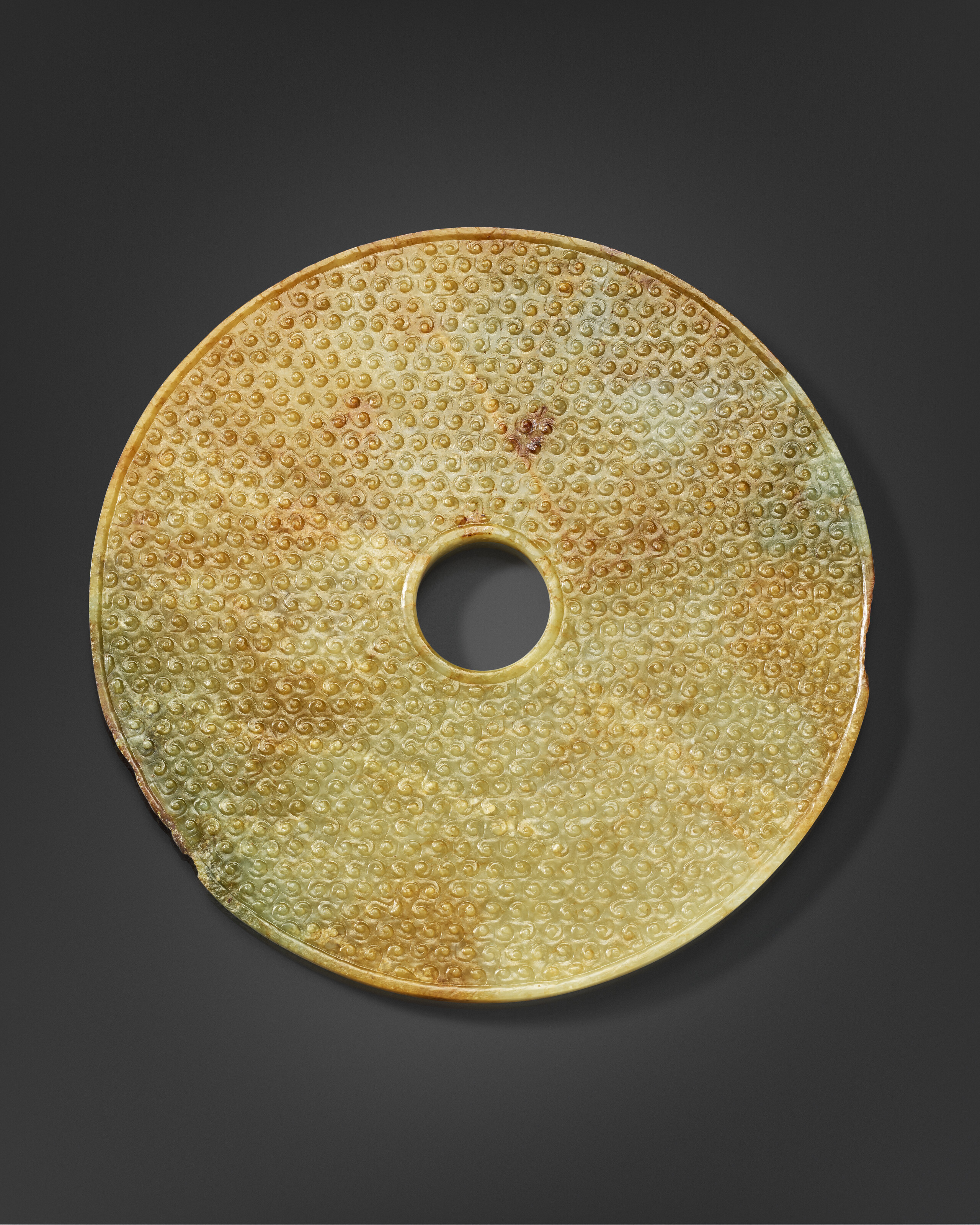 A VERY RARE AND SUPERBLY CARVED PALE YELLOW AND RUSSET JADE 'GRAIN ...