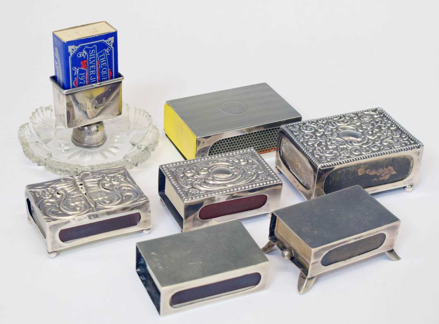 Six match box holders together with a silver mounted and cut glass ...