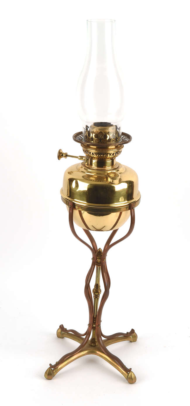 MANNER OF W. A. S. BENSON, a copper and brass oil lamp base, with ...