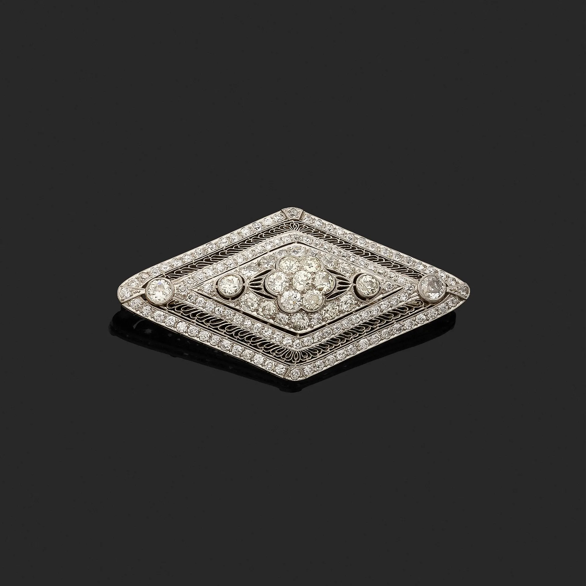 BROCHURE in the shape of a lozenge with floral and geometric motifs ...