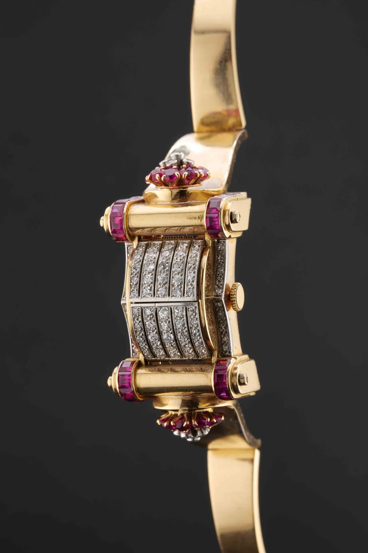 COCKTAIL WATCH Circa: 1950. Case: clamshell tonneau, entirely paved ...