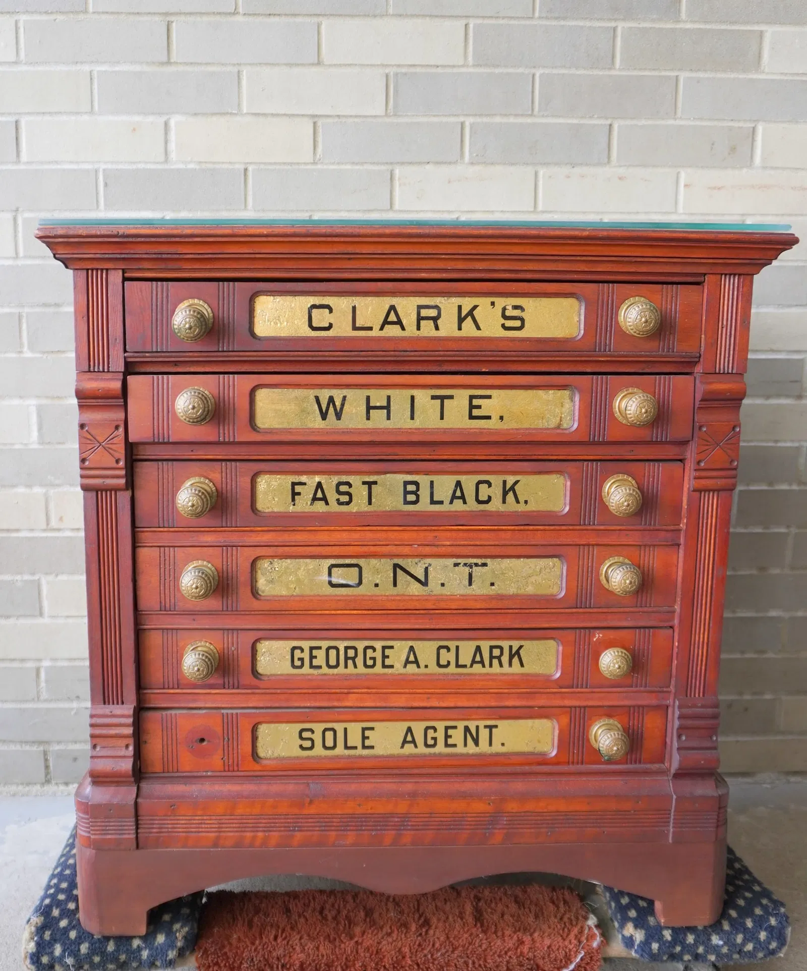 A refinished Clark's stained cherry 6 drawer spool cabinet each with ...