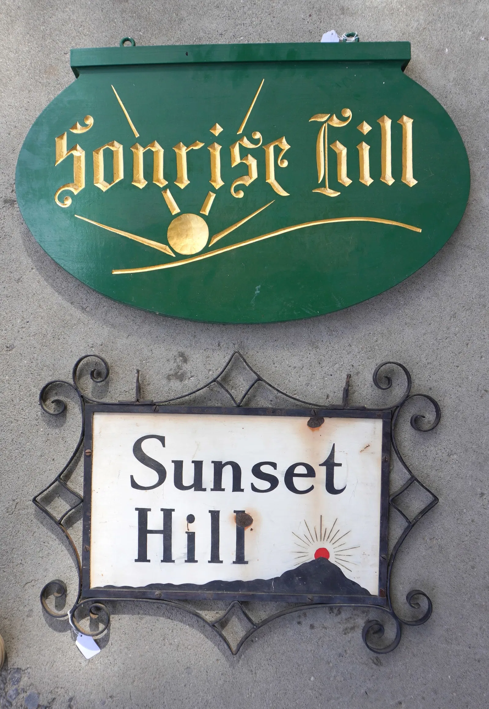 Two signs "SUNSET HILL" and "SUNRISE HILL" signs. The first, circa ...
